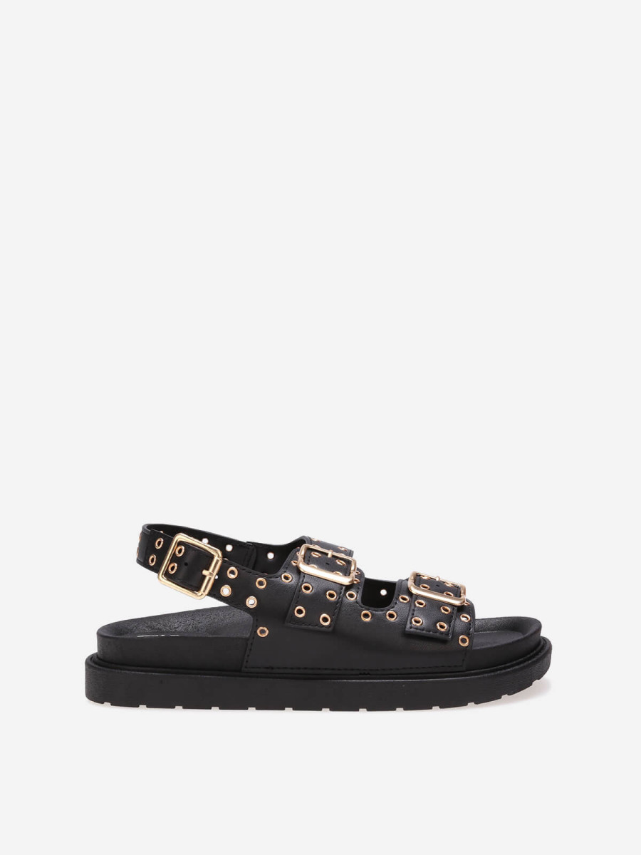 Sandales noires à boucles et œillets métalliques